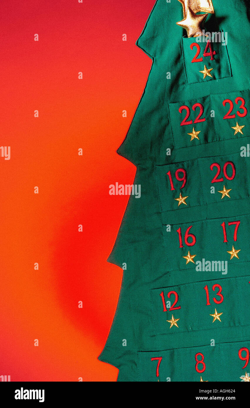 Section of fabric Christmas advent calendar in the shape of a tree ...