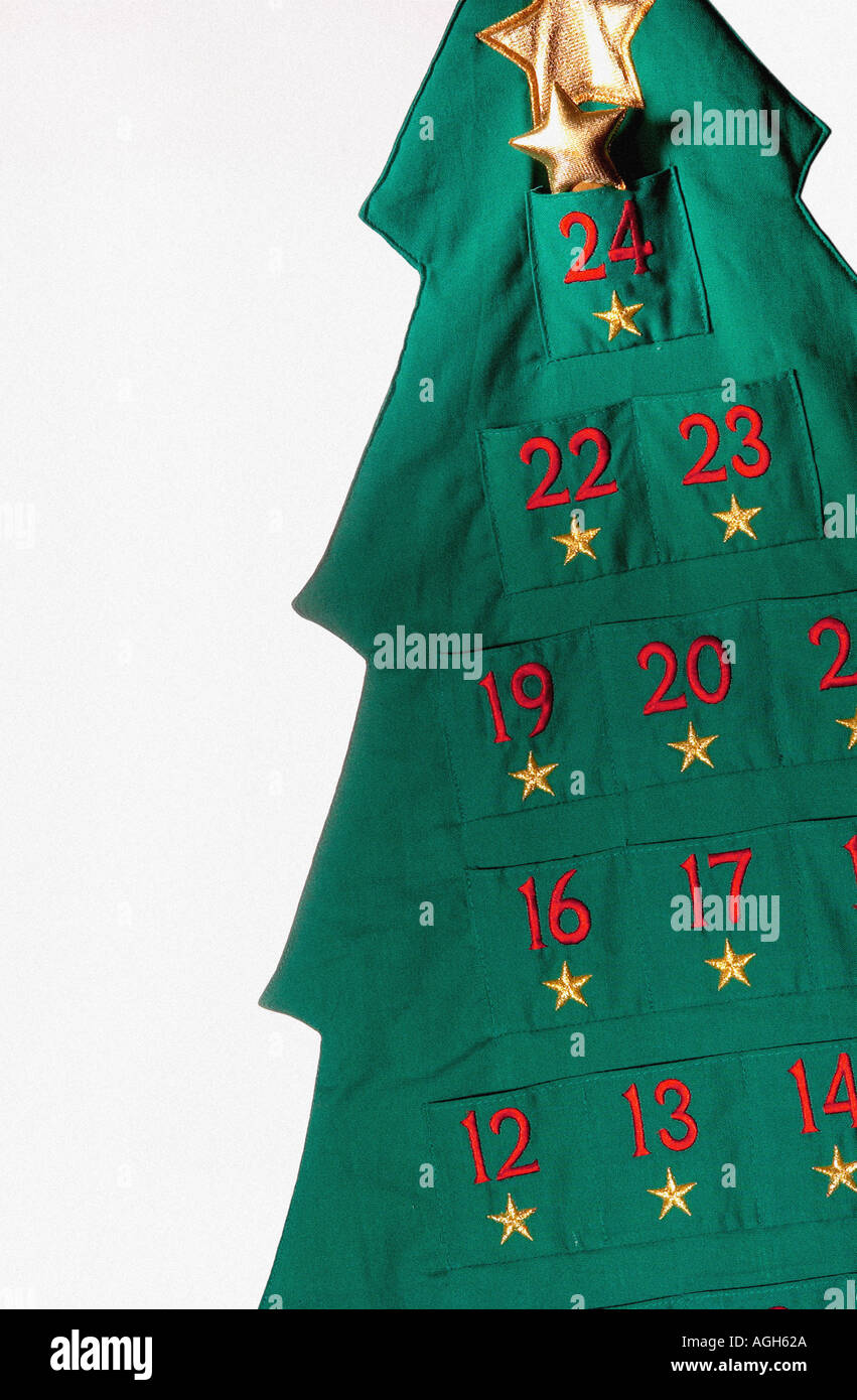 Section of fabric Christmas advent calendar in the shape of a tree ...