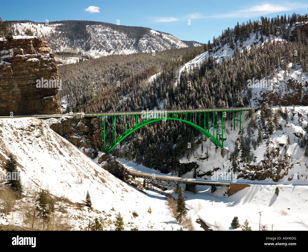Mountain landscape with bridge crossing over roadway Stock Photo - Alamy