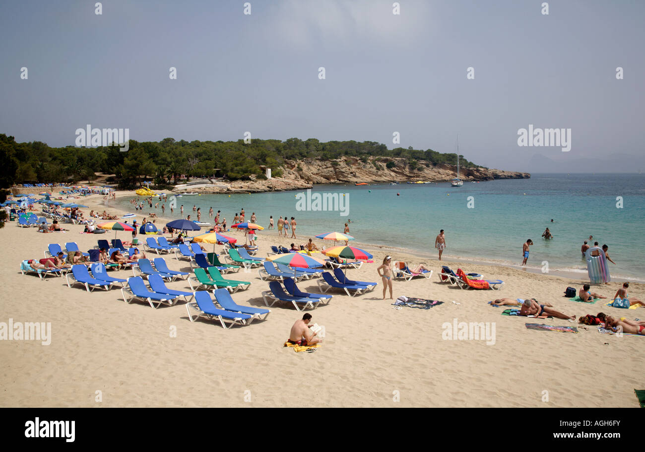 People relaxing at a beach in Cala Bassa, Ibiza, Spain Stock Photo - Alamy