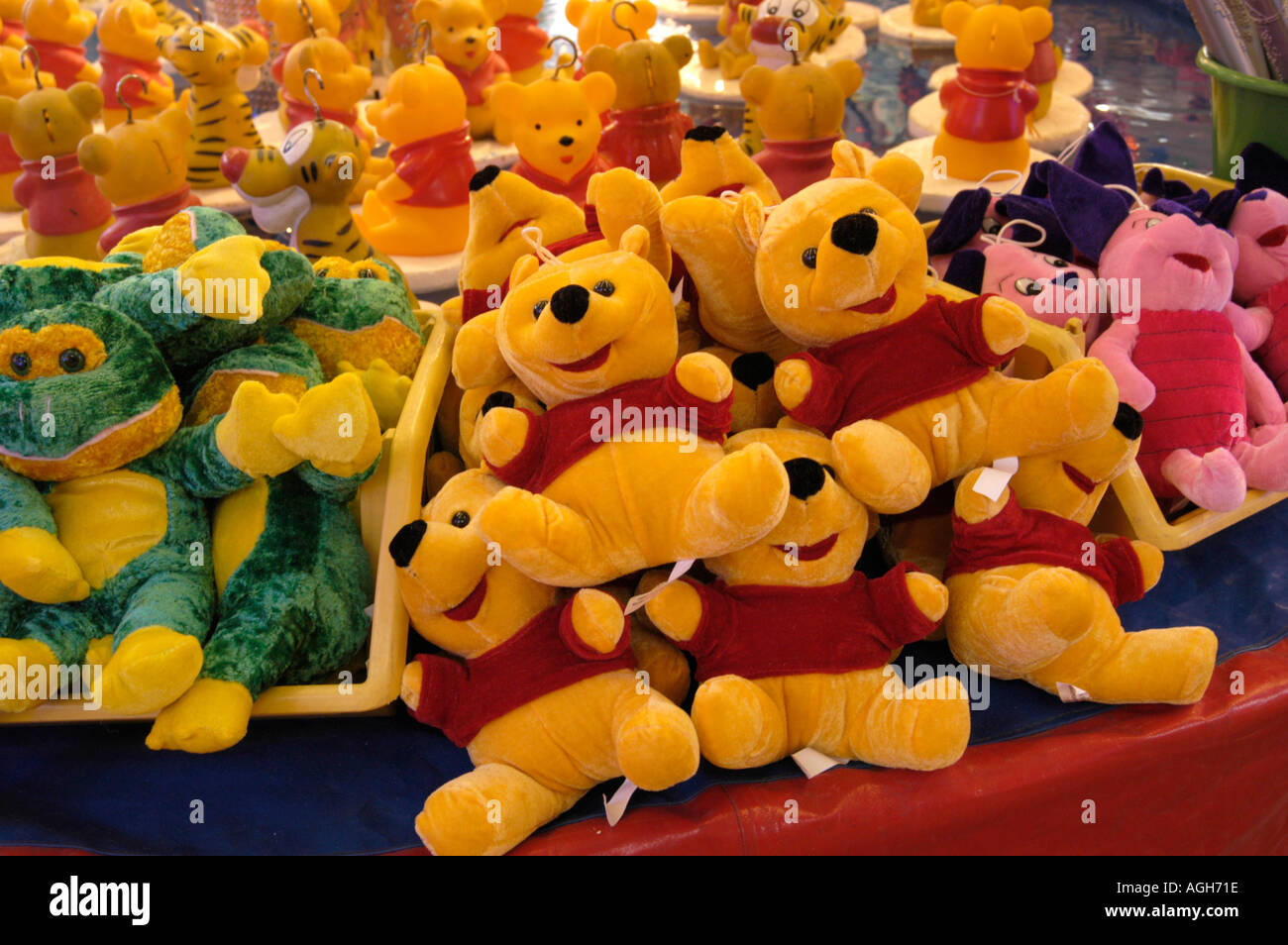 cuddly toys on display as prizes at stall at fun fair Stock Photo - Alamy