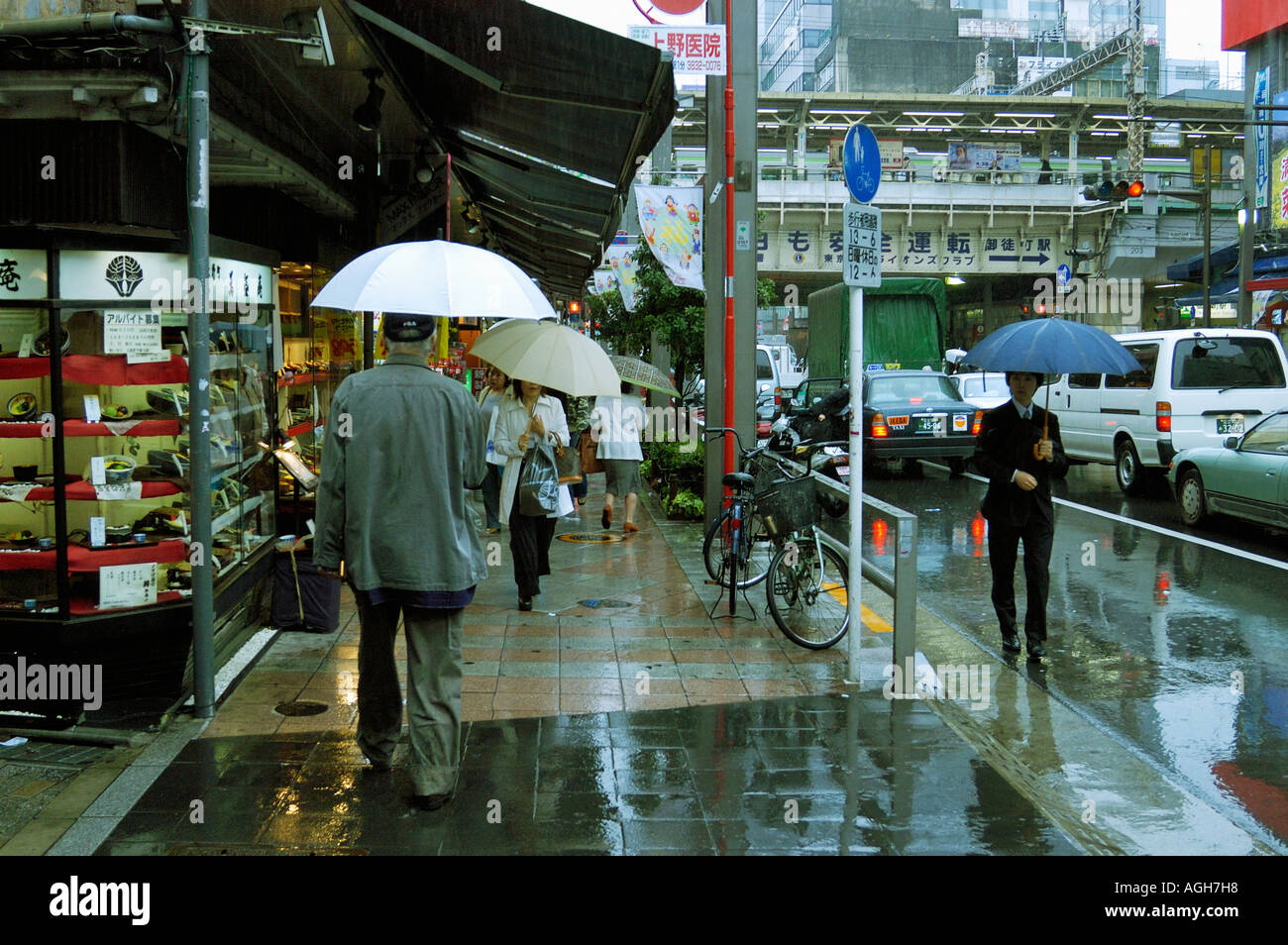 heavy rain and people with umbrellas, Ueno, Tokyo, Japan Stock Photo ...