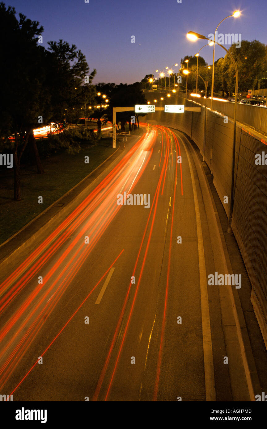 Car light trails on city street at night Nice France Stock Photo - Alamy