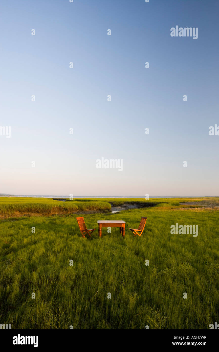 Wooden table and chairs in a salt marsh Massachusetts USA Stock Photo ...