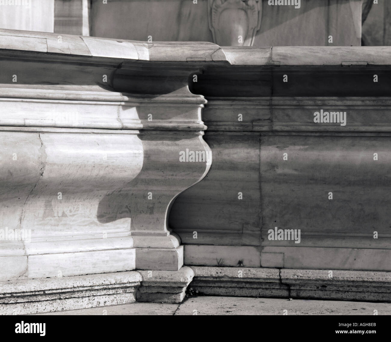 Carved stone molding at the base of a building exterior in Rome Italy ...