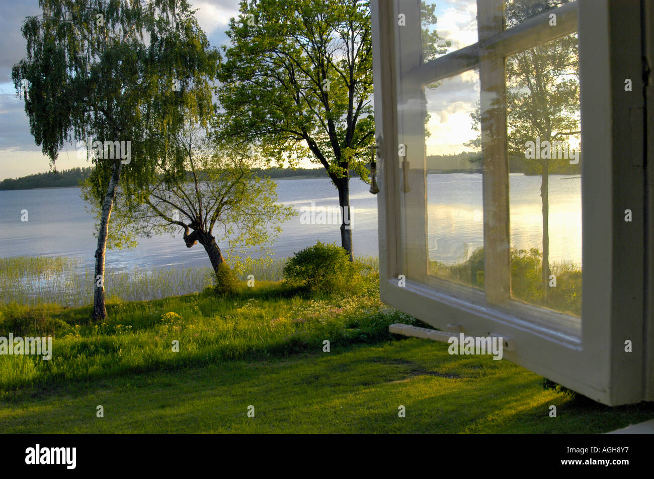 view over lake from old-fashioned window, Sweden Stock Photo - Alamy