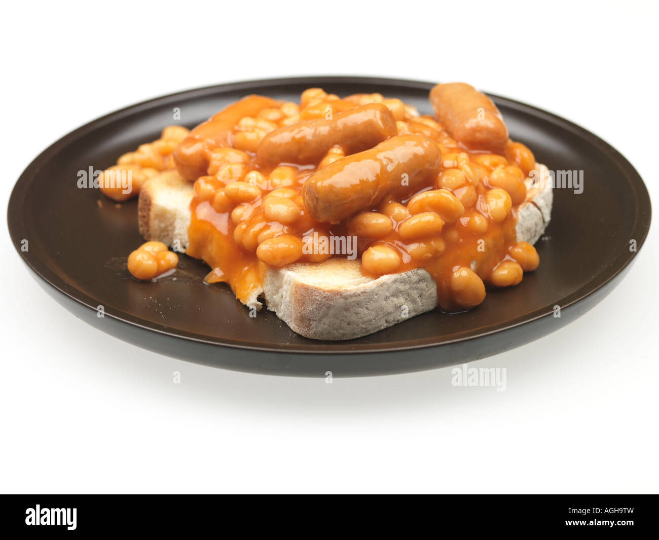 Tin Of Baked Beans In Tomato Sauce With Pork Sausages On Toast Meal ...