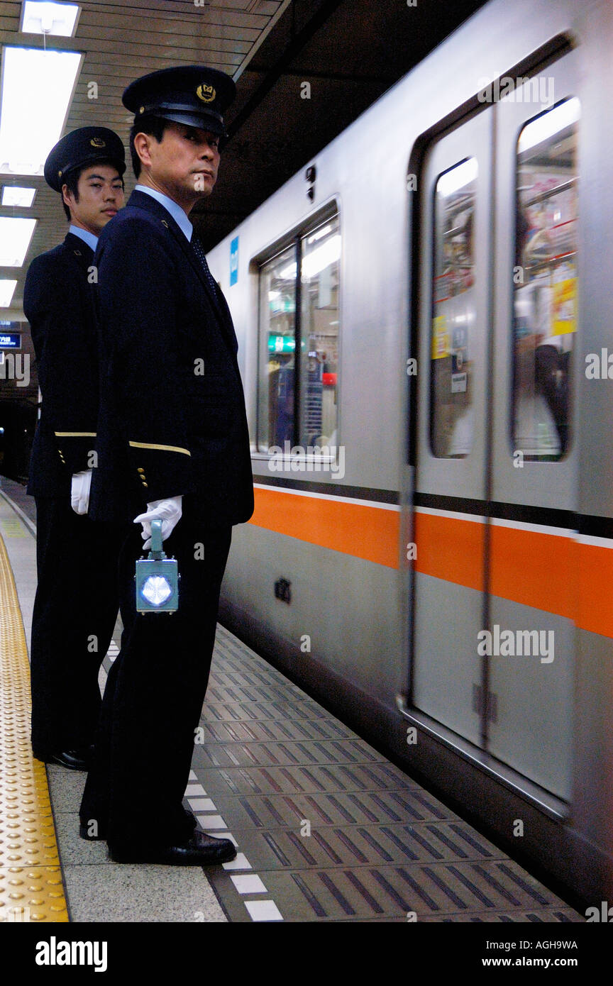 Japan metro attendant hi-res stock photography and images - Alamy