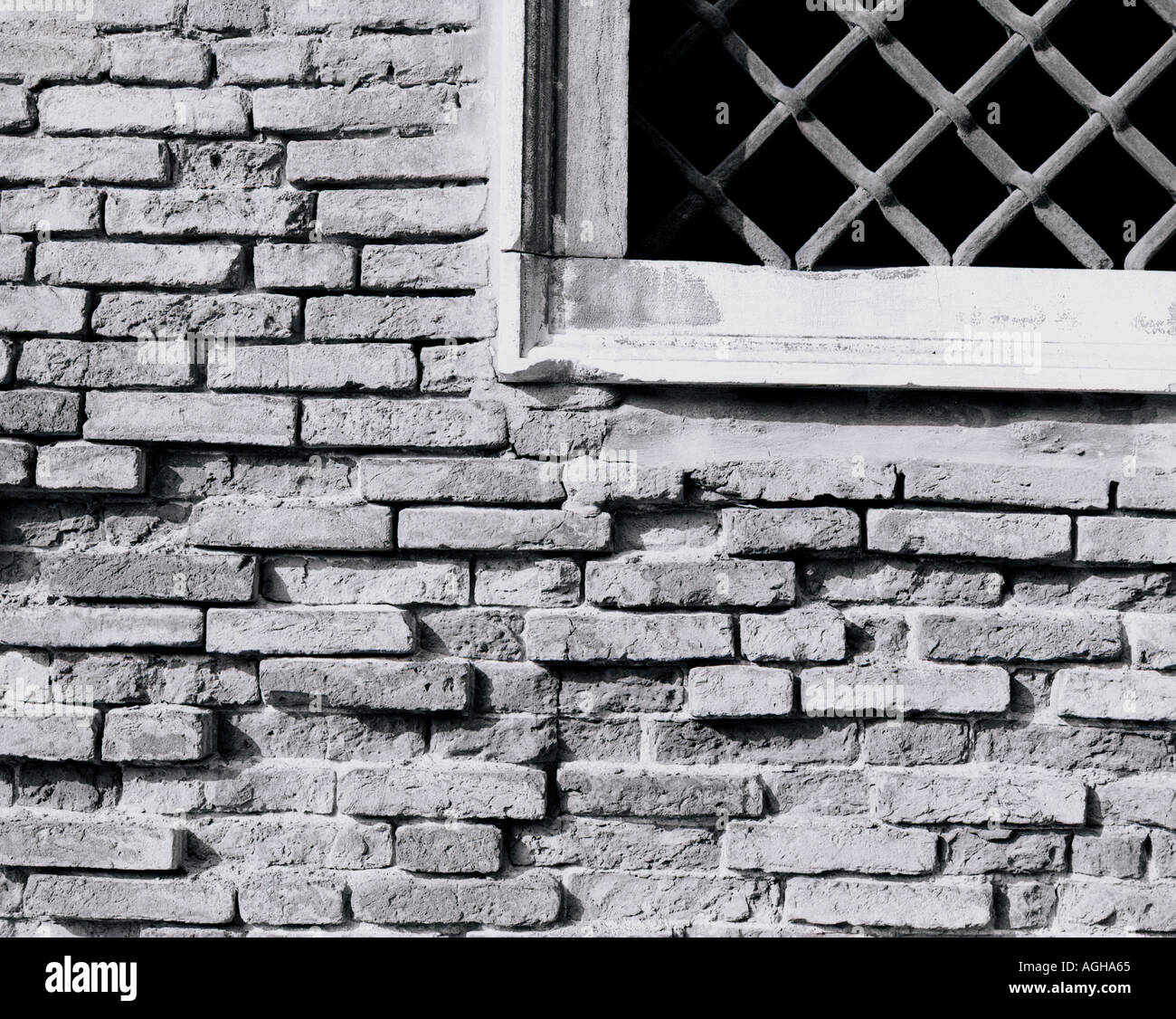 Detail of stone and brick wall and window Stock Photo - Alamy