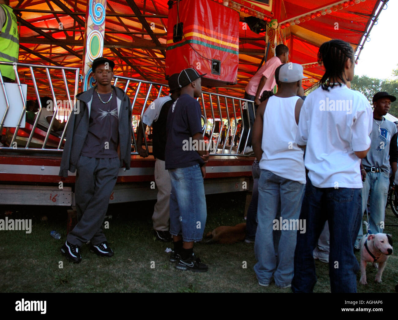Group of youth hanging around Fun Fair at Lambeth Country Fair in ...