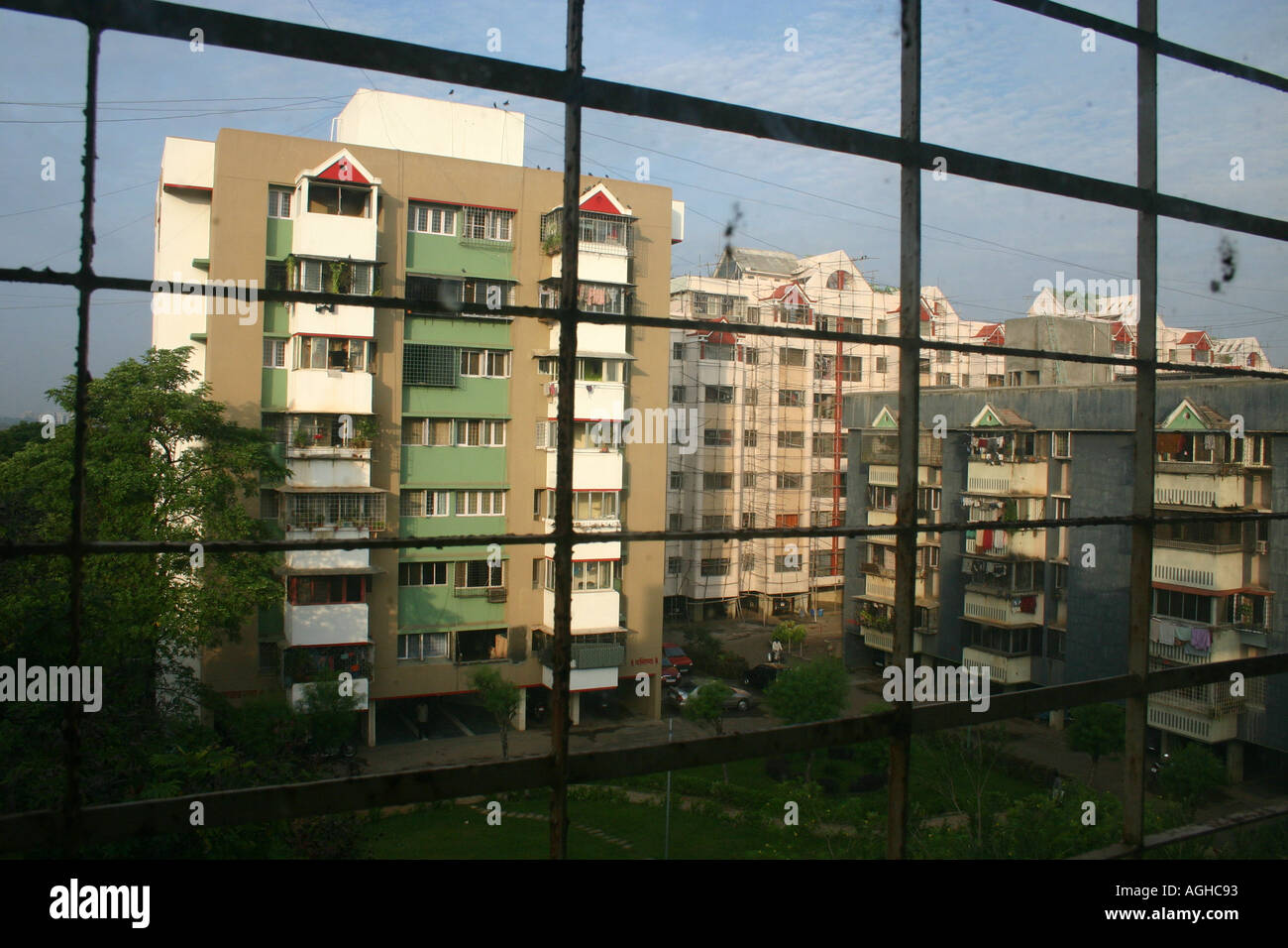 RSC91086 high rise building seven floors seen through iron window ...
