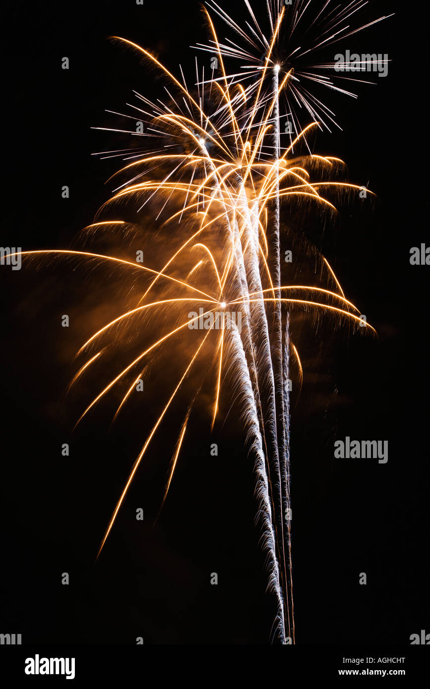 Colorful fireworks exploding in night sky Stock Photo - Alamy