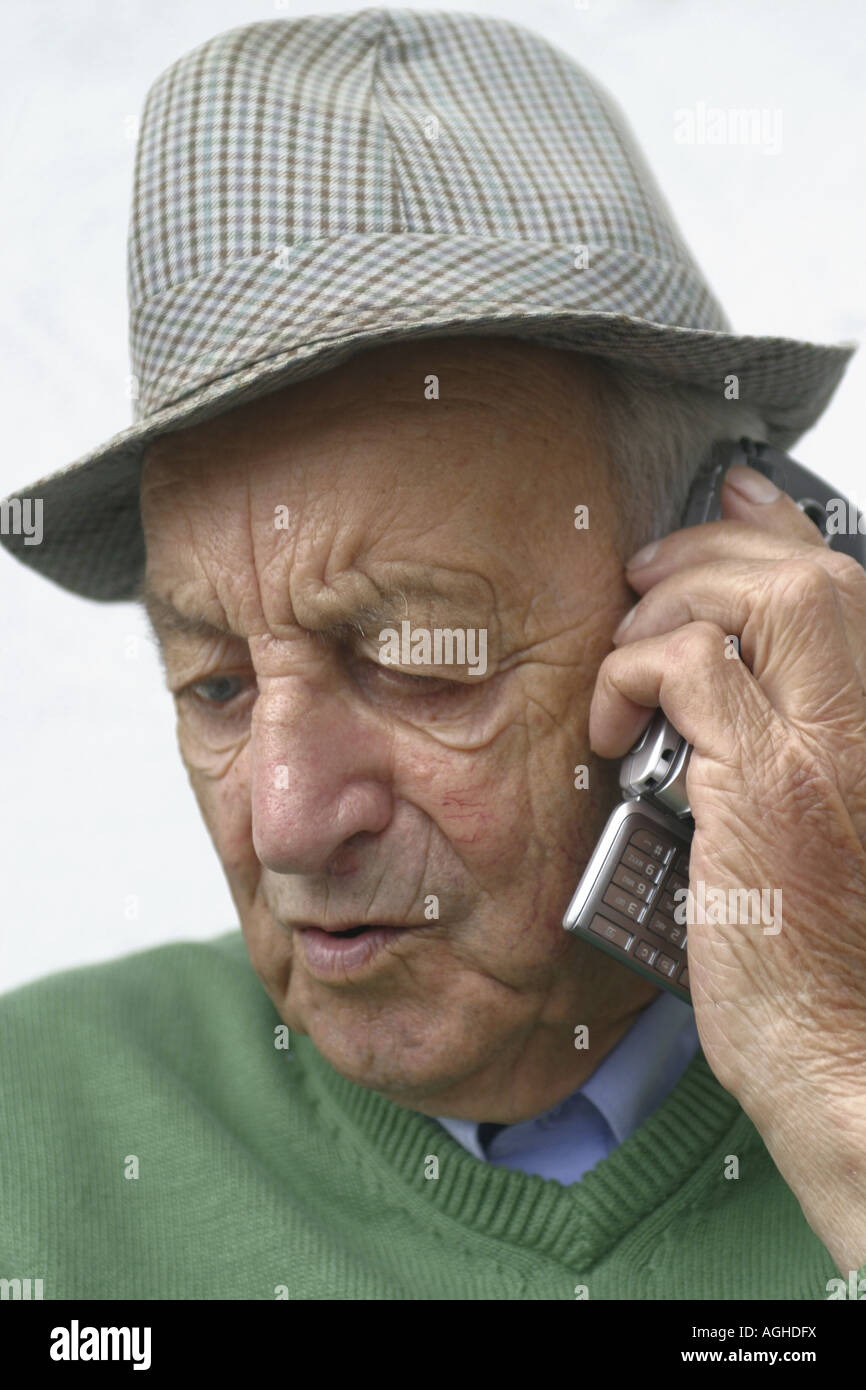 old man calling with a mobile phone Stock Photo - Alamy
