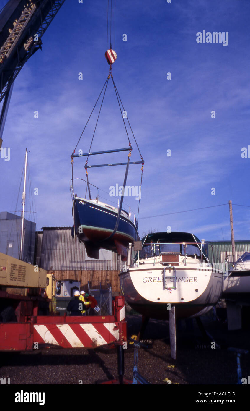 boat being lifted by crane Stock Photo - Alamy