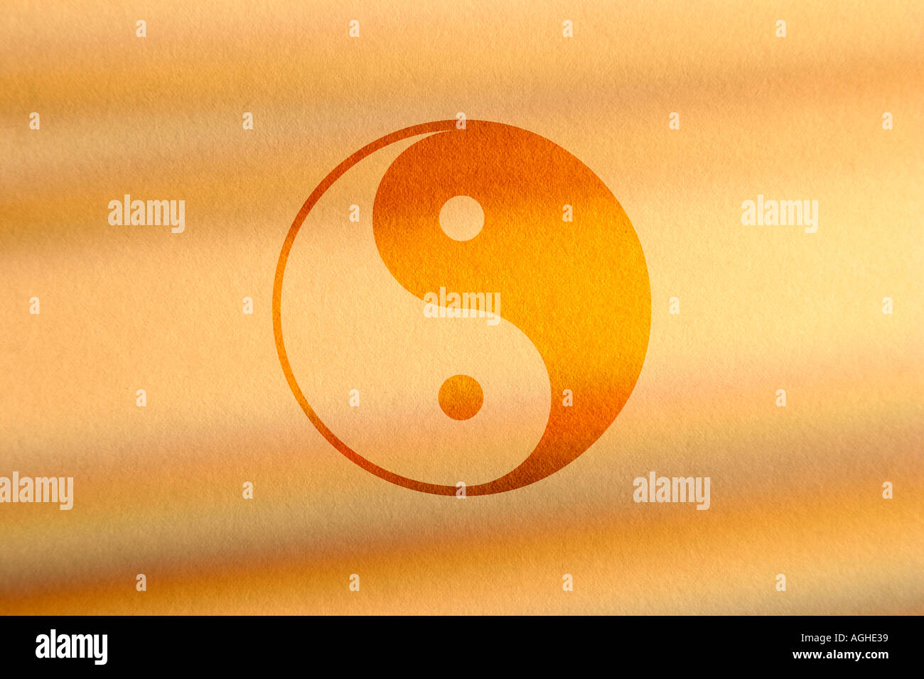 Chinese ying yang symbol on a yellow background Stock Photo - Alamy