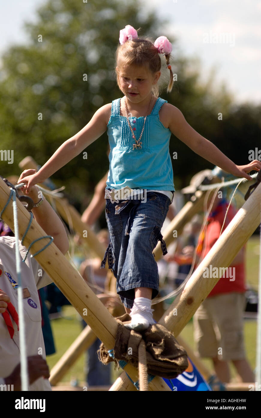 Girl walking tightrope hi-res stock photography and images - Alamy