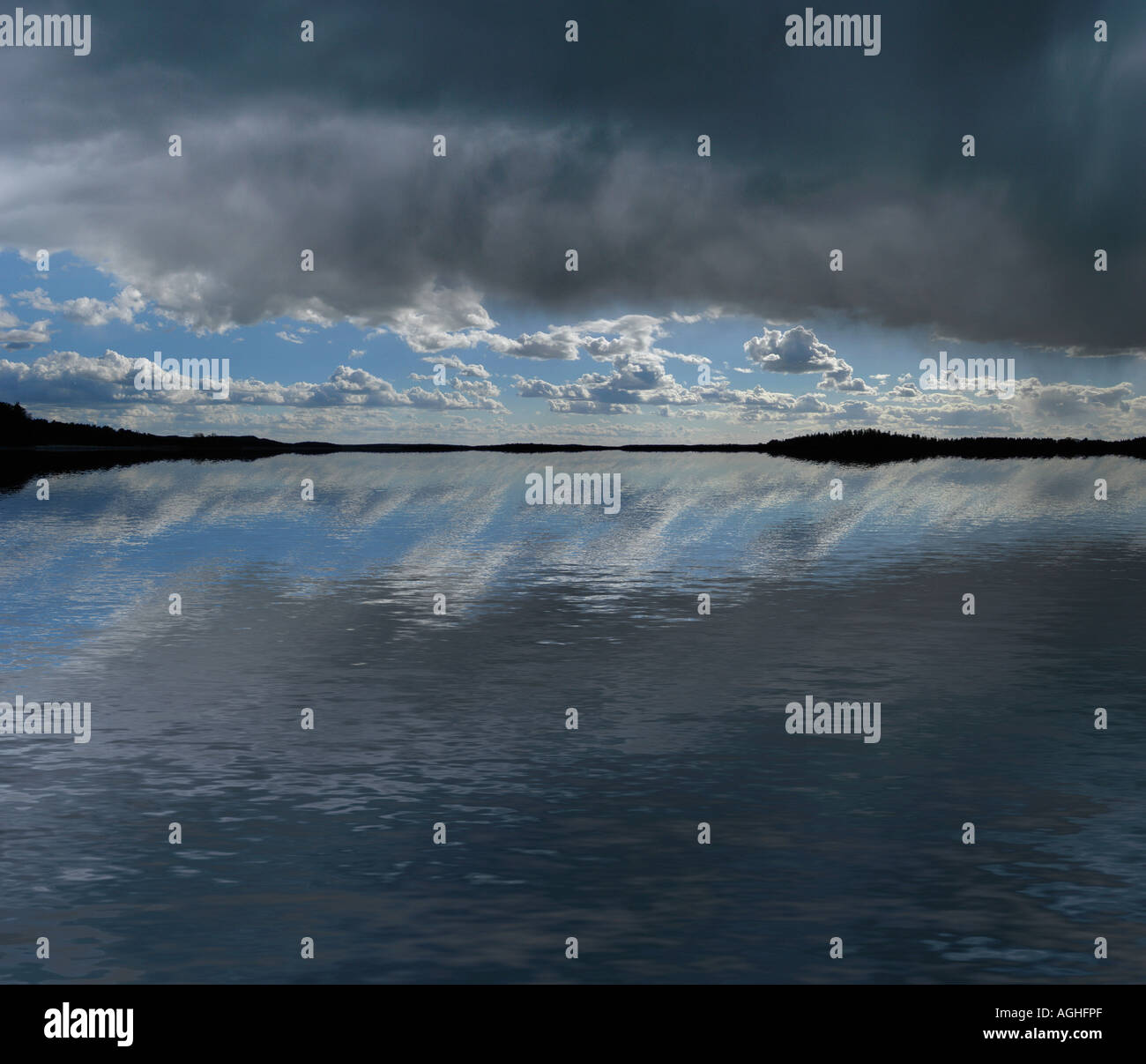 heavy and rainy clouds against clear blue sky, Sweden Stock Photo - Alamy