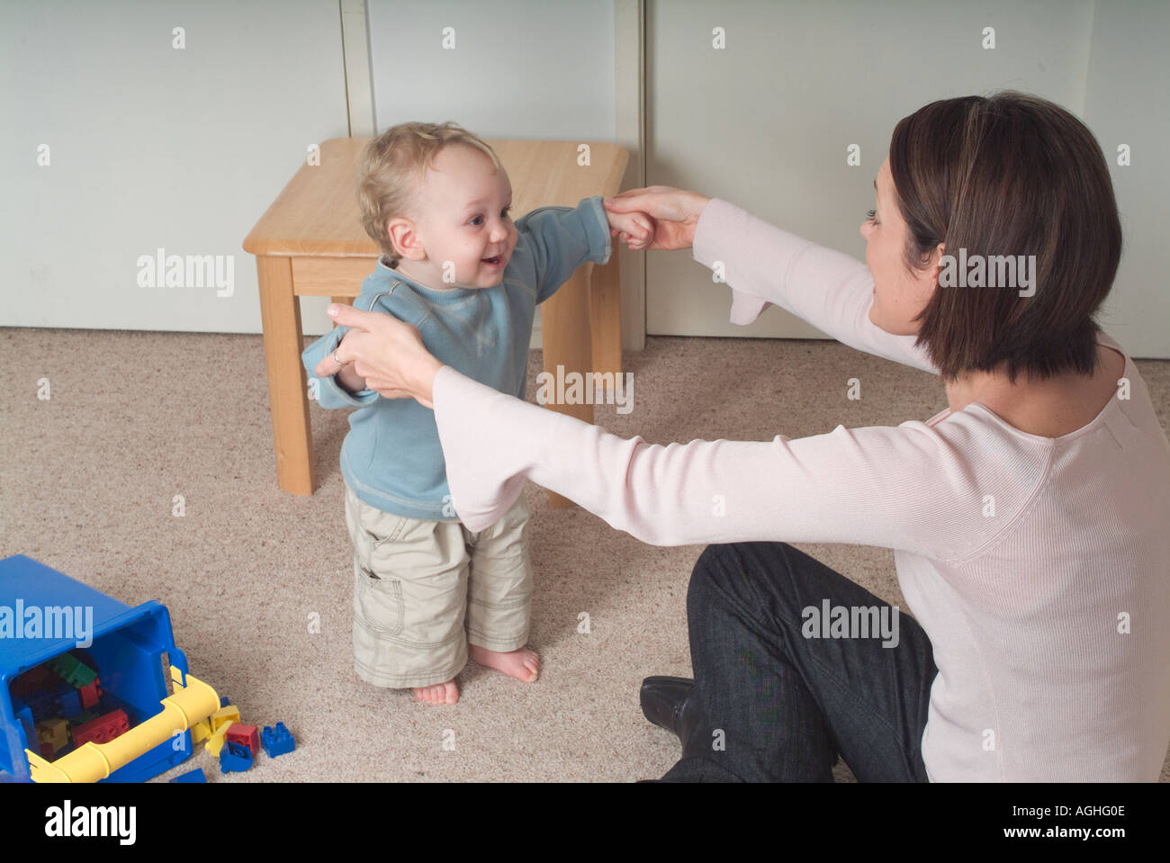 Baby mother hand in hand walk hi-res stock photography and images - Alamy
