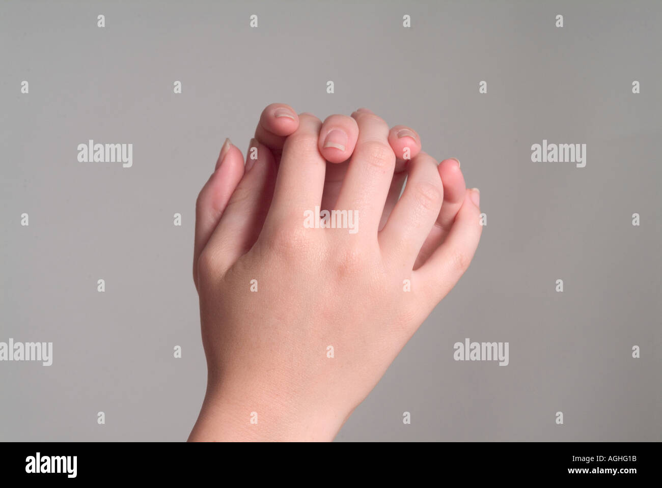 Curled hands hi-res stock photography and images - Alamy