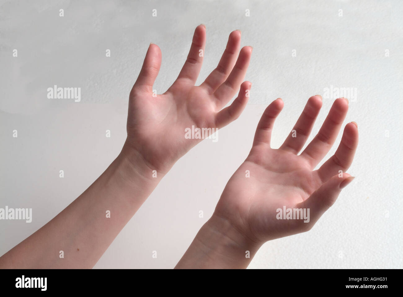 Two open hands extended forward with fingers and thumbs separated Stock ...