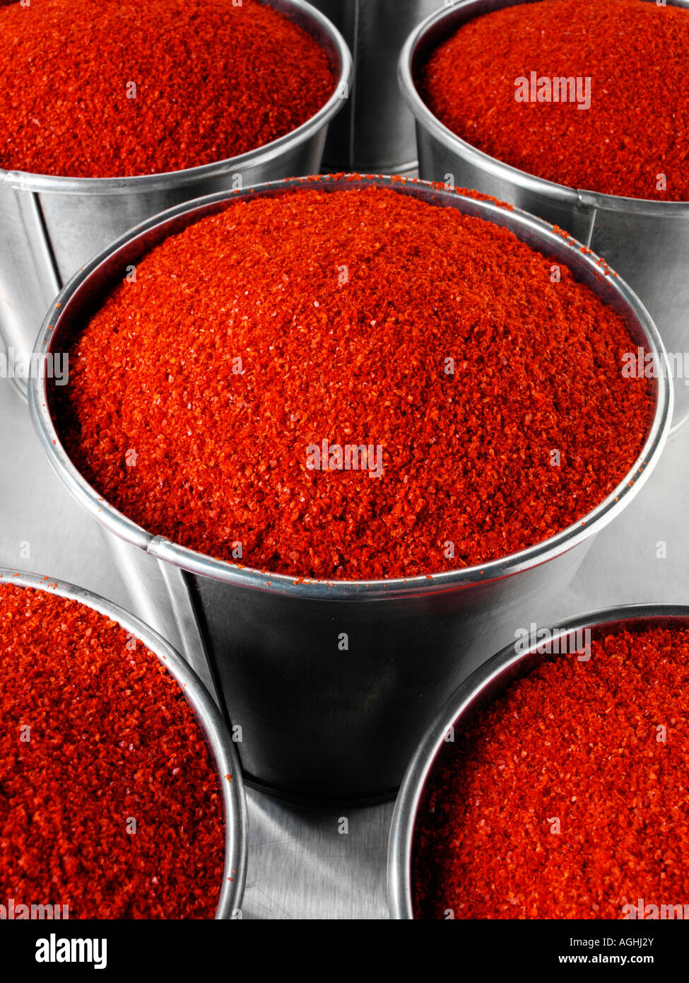 CONTAINERS FULL OF CHILLI POWDER Stock Photo - Alamy