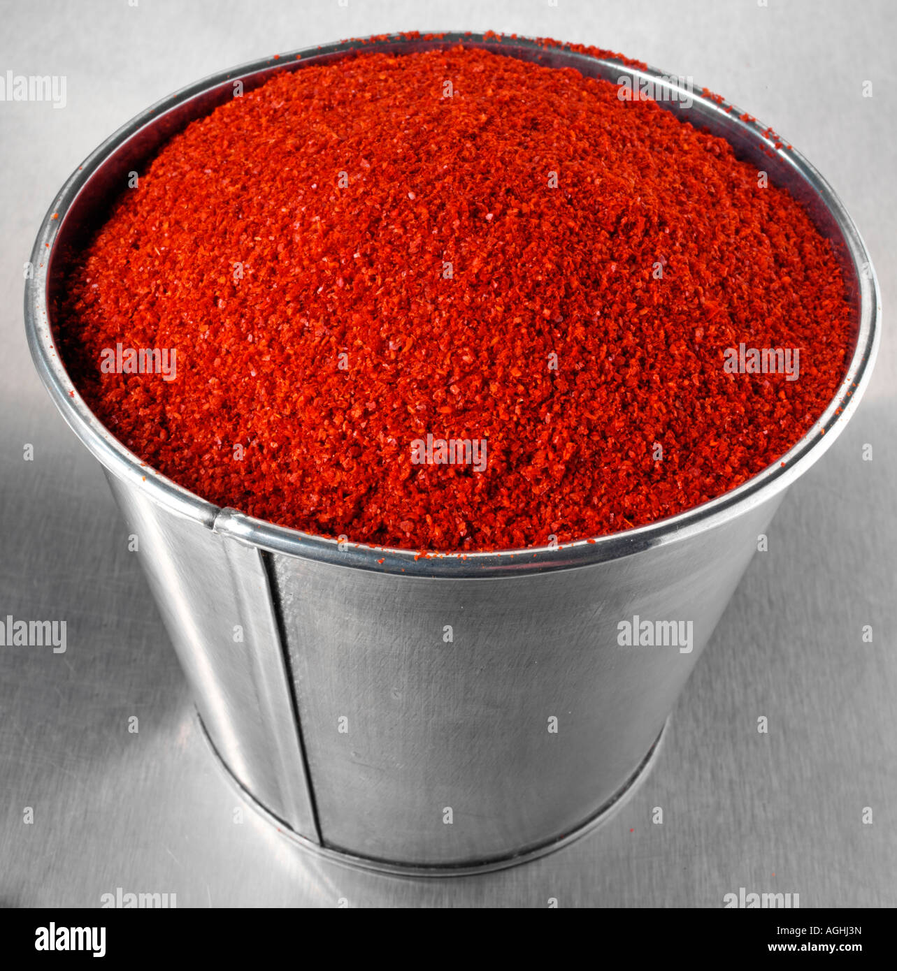 CONTAINER FULL OF CHILLI POWDER Stock Photo - Alamy