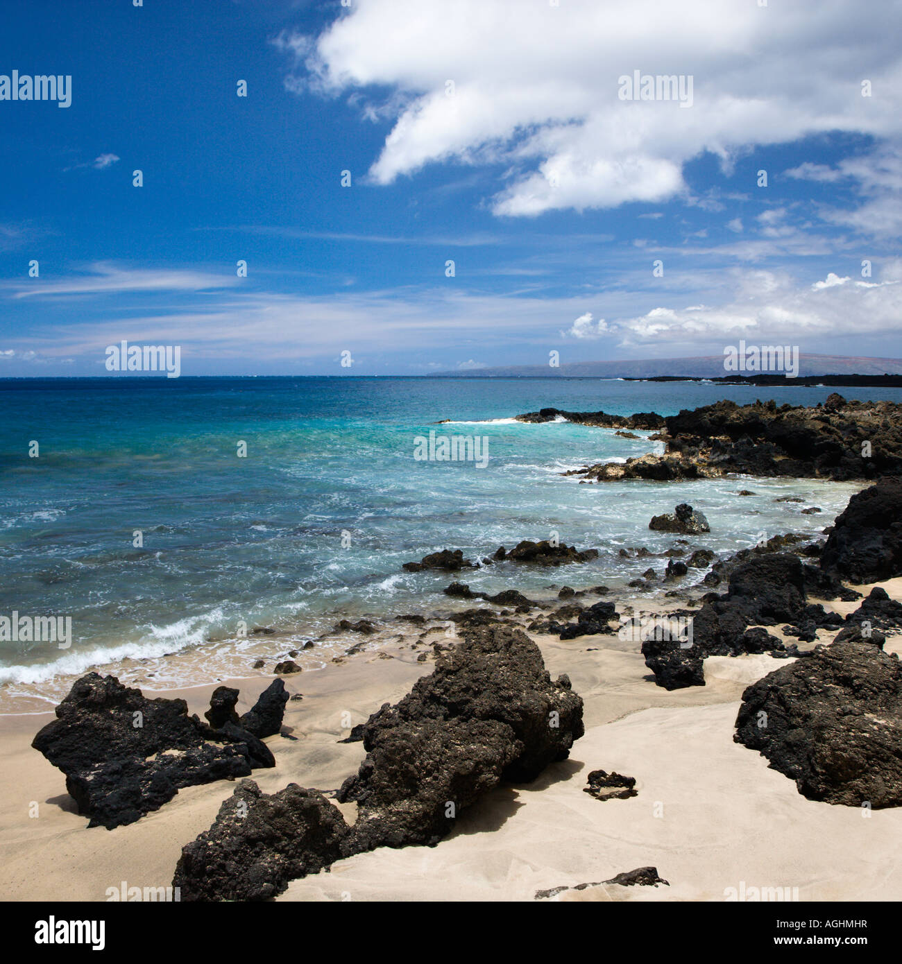 Beach in Maui Hawaii with lava rocks Stock Photo - Alamy