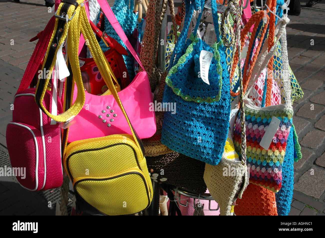 display of coloured handbags Stock Photo - Alamy