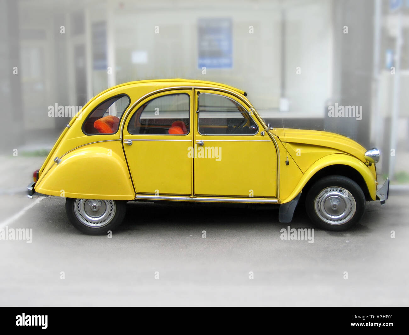 yellow citroen deux chevaux parked by roadside Stock Photo - Alamy