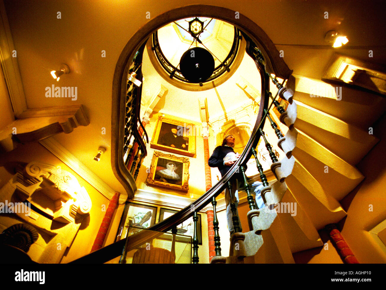 Woman curator of award winning small museum moving exhibits Stock Photo ...