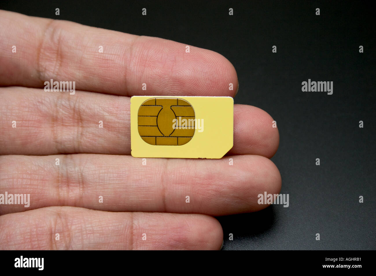 hand holding SIM card for mobile phone Stock Photo - Alamy