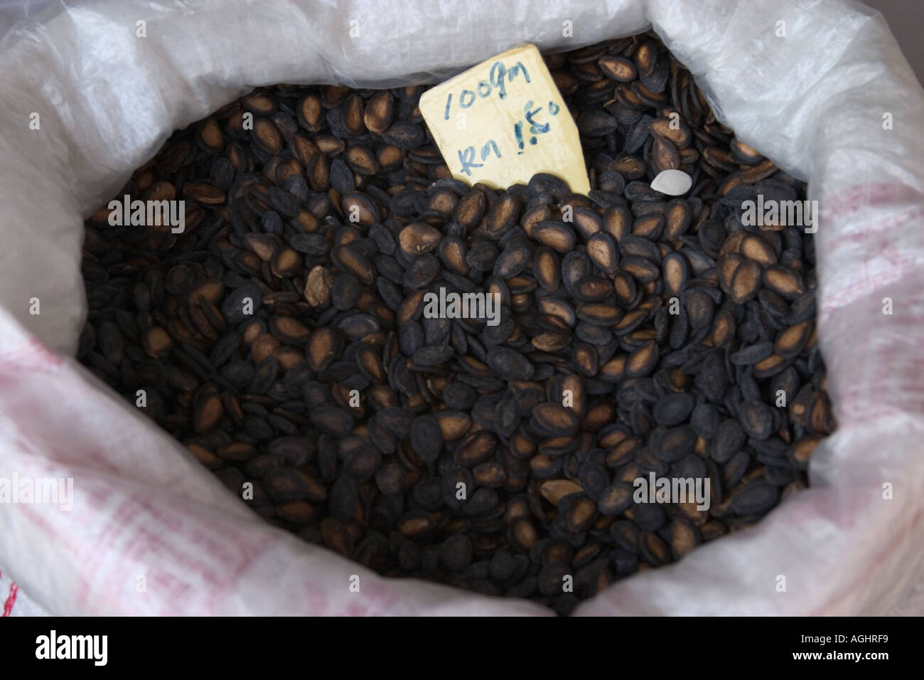 black kuaci pumpkin seed Asian snack Stock Photo - Alamy