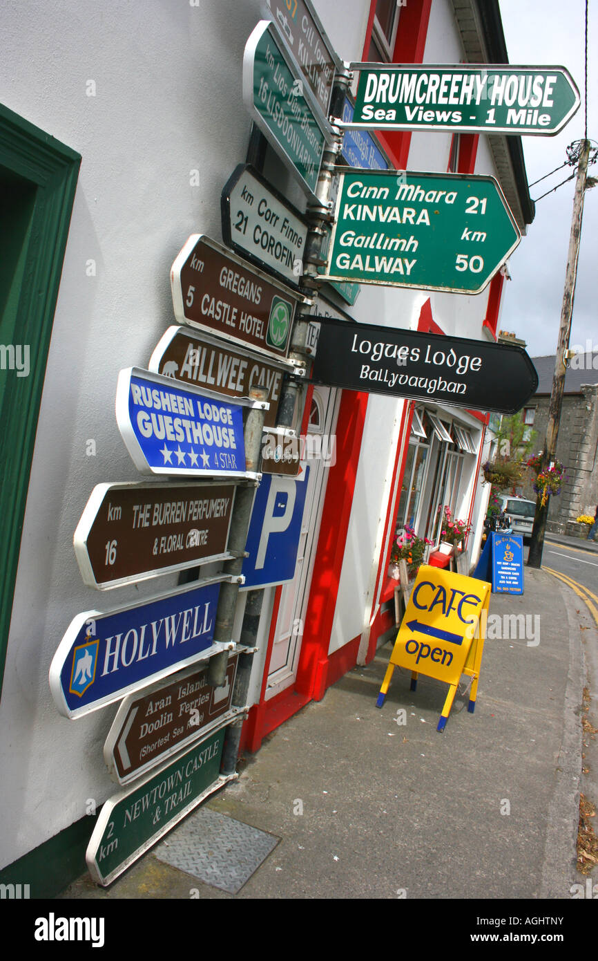 multitude of direction signs in Ballyvaughan, County Clare, Ireland ...