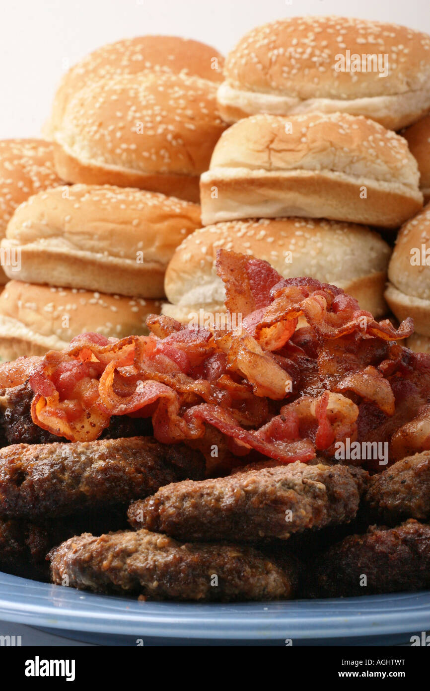 home made of empty buns fried bacon frying hamburgers fast food plate ...