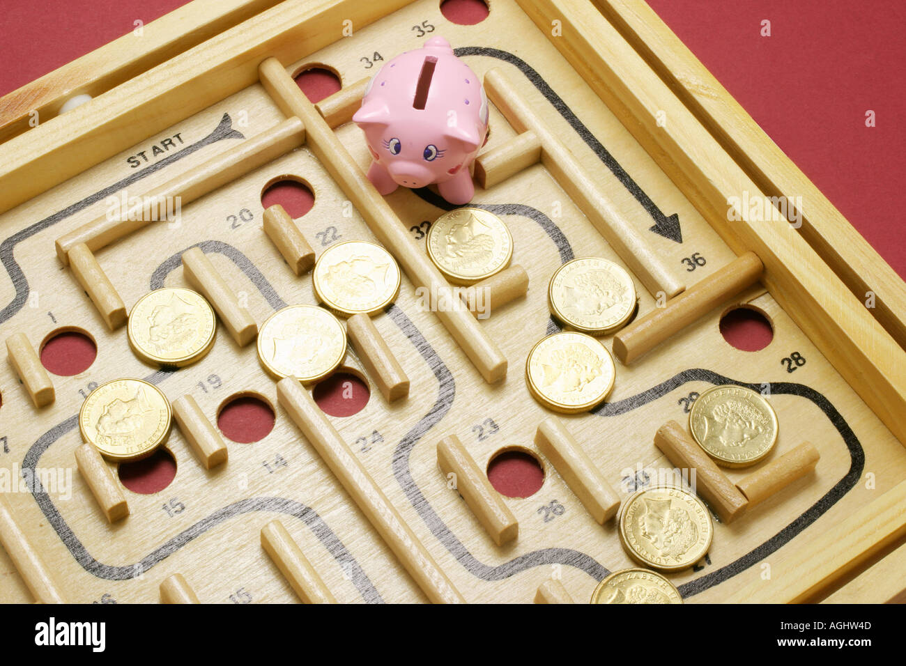 Savings maze coins piggy bank hi-res stock photography and images - Alamy