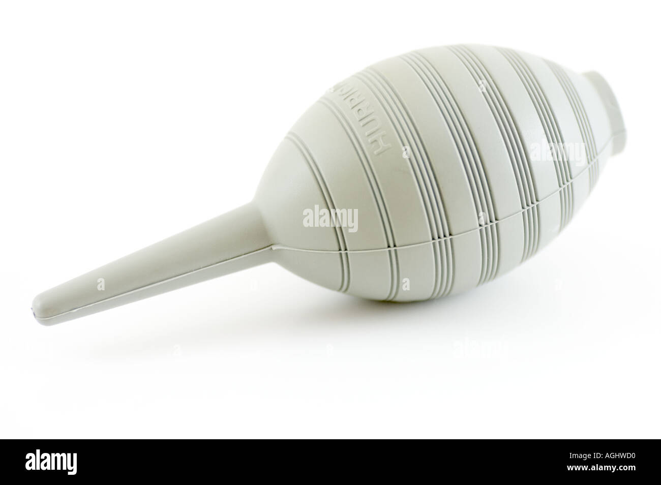 An air blower for cleaning dust from camera equipment against a white ...