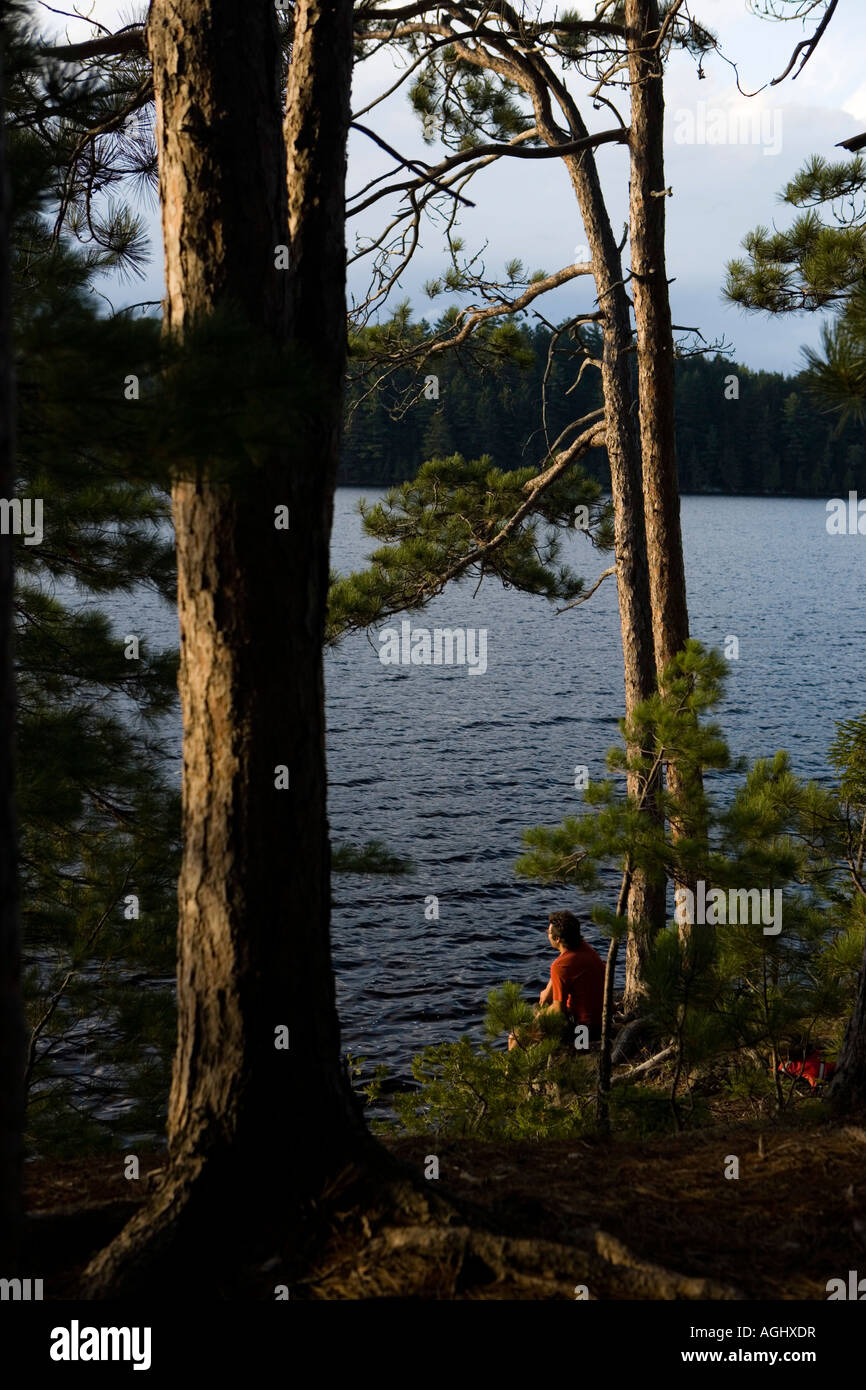 Sitting beneath a tree hi-res stock photography and images - Alamy