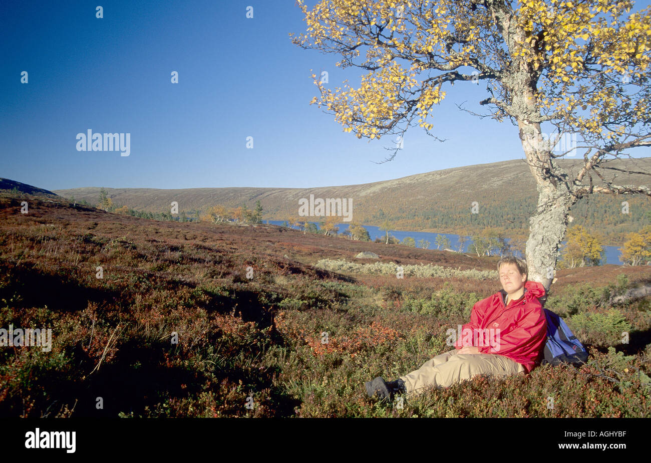 Female hiker resting Stock Photo - Alamy