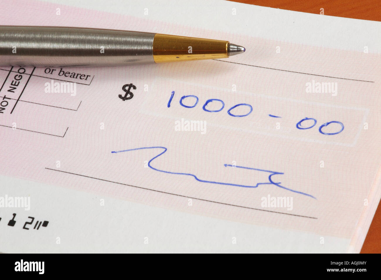 Cheque book pen signature hi-res stock photography and images - Alamy