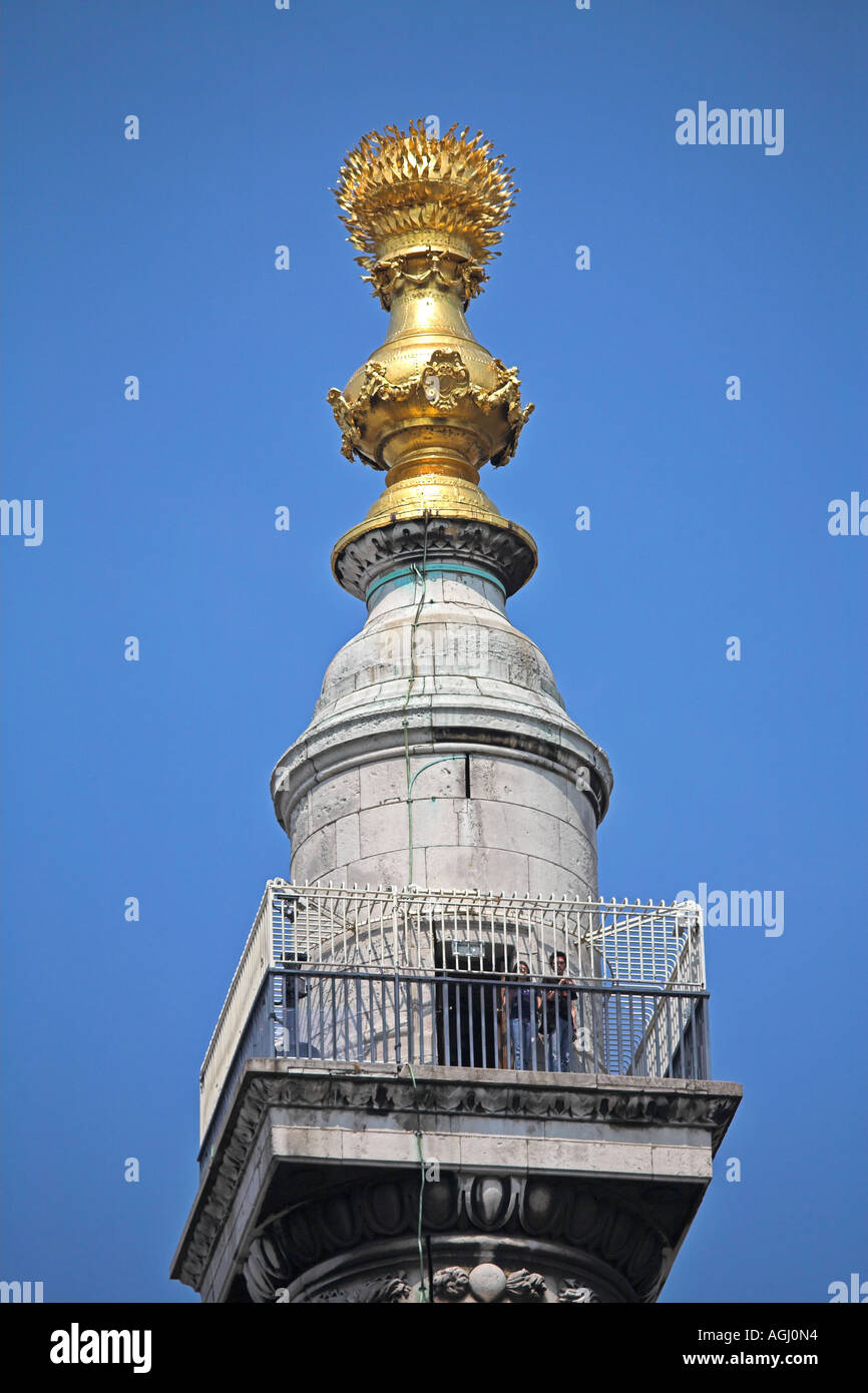 The Monument memorial to the Great Fire of London 1666 with a man and ...