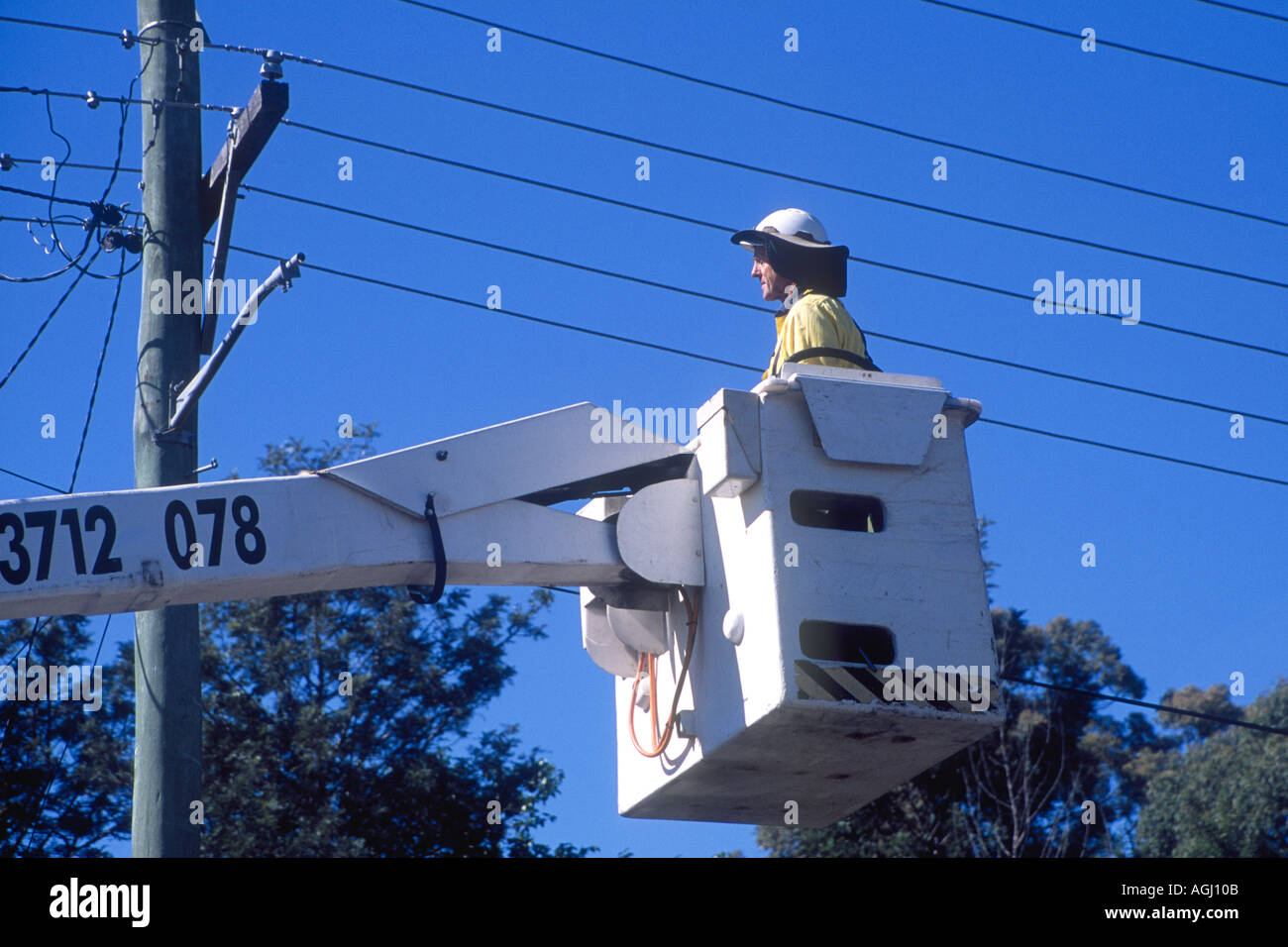 Electricity Worker in Elevated Work Platform Stock Photo - Alamy