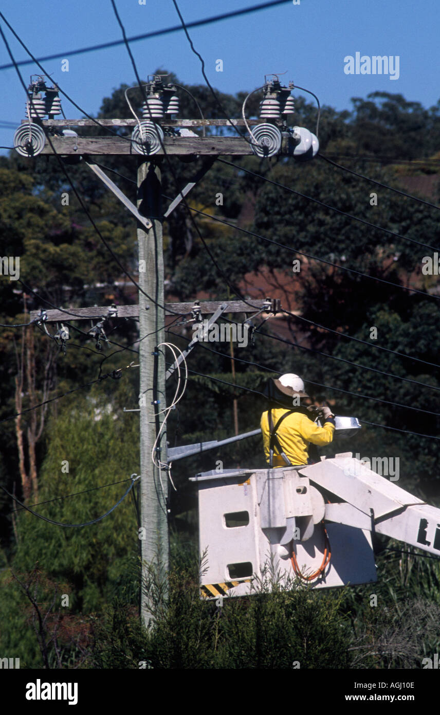 Electricity Worker working in an Elevated Work Platform Stock Photo - Alamy