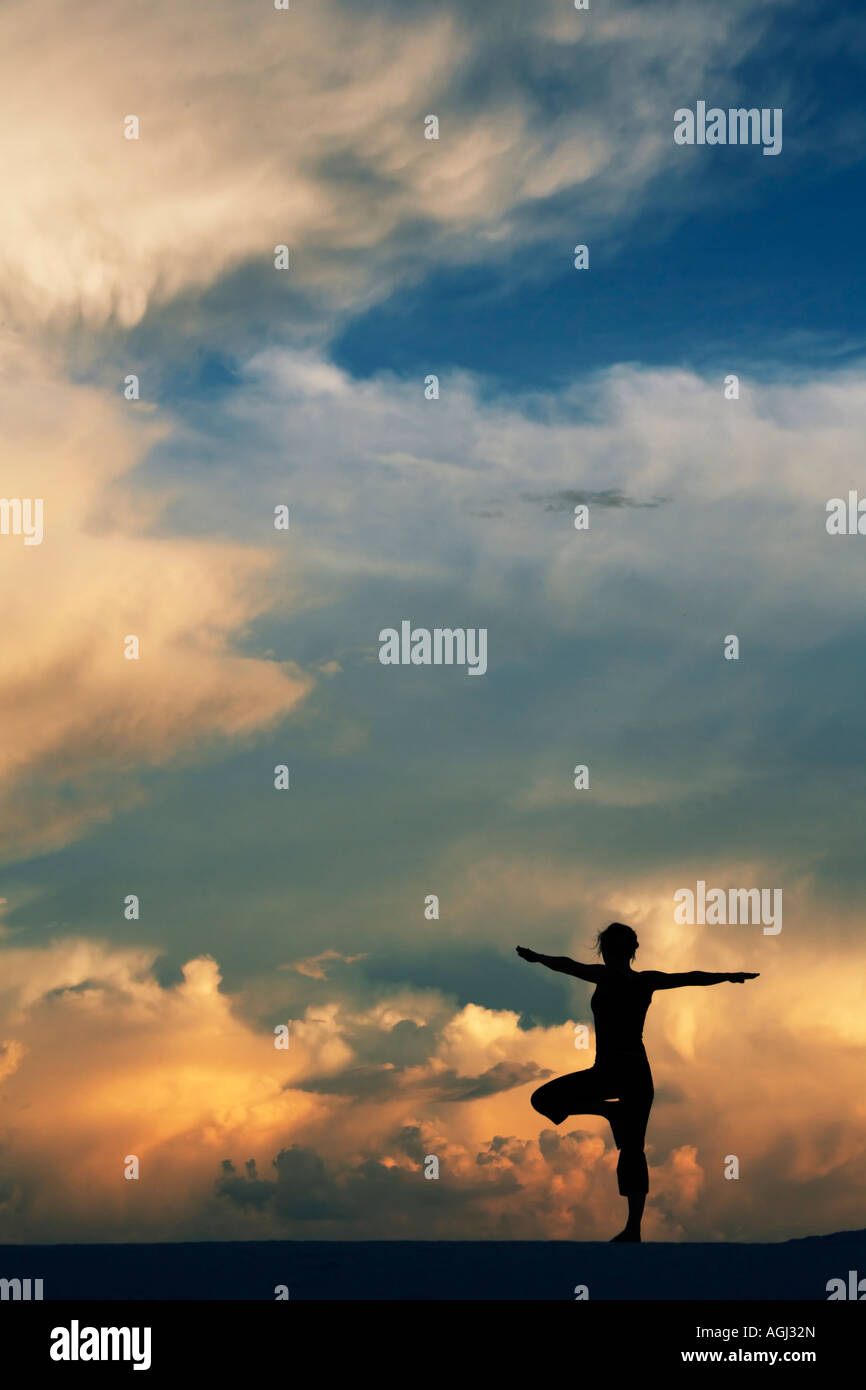desert storm yoga sunset Stock Photo - Alamy