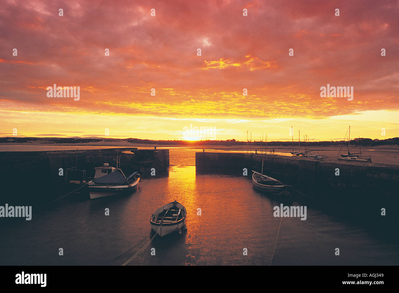 Beadnell harbour at sunset Northumberland Stock Photo - Alamy
