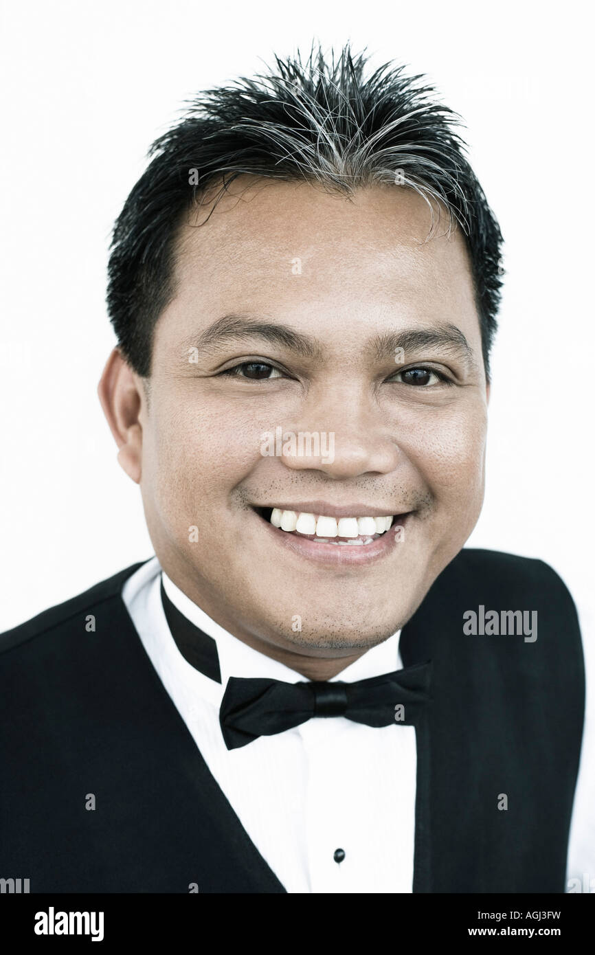 Portrait of a waiter smiling Stock Photo - Alamy