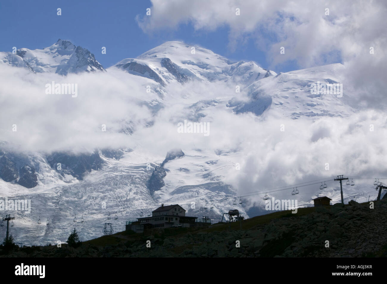 A skiing chair lift on the Brevent in front of Mont Blanc Stock Photo ...