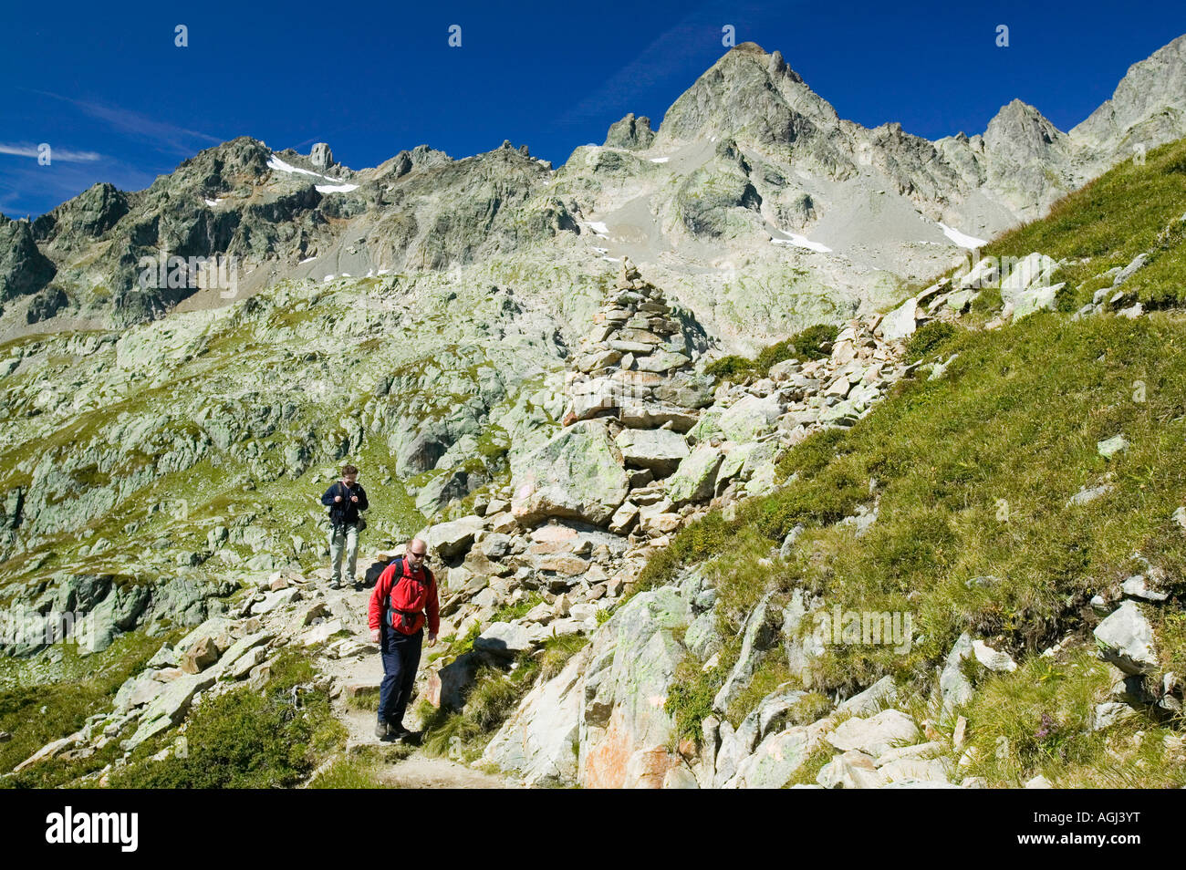 Walkers in the Aiguille Rouge National Park above Chamonix France Stock ...