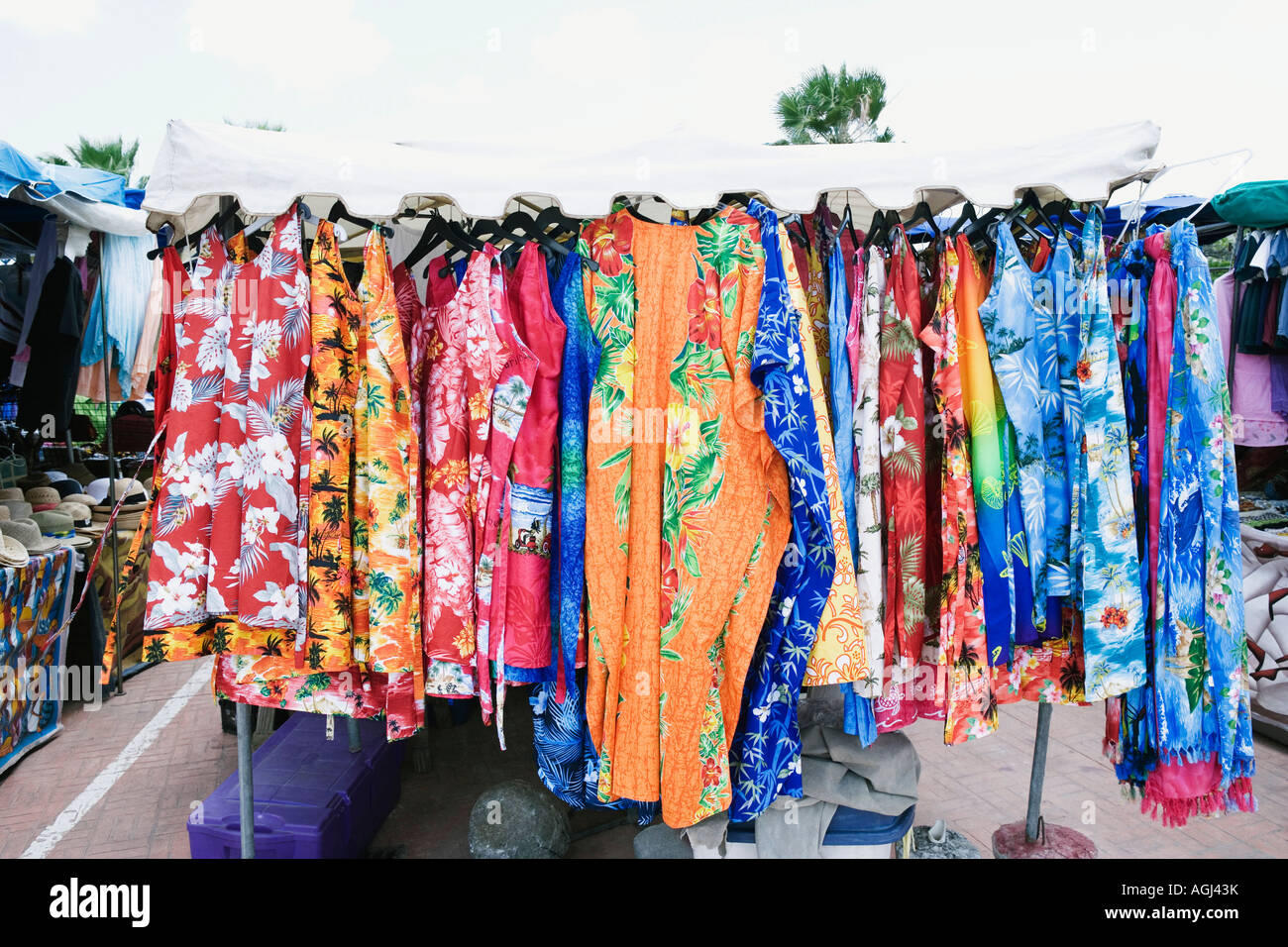 Clothes hanging in a market stall Stock Photo - Alamy