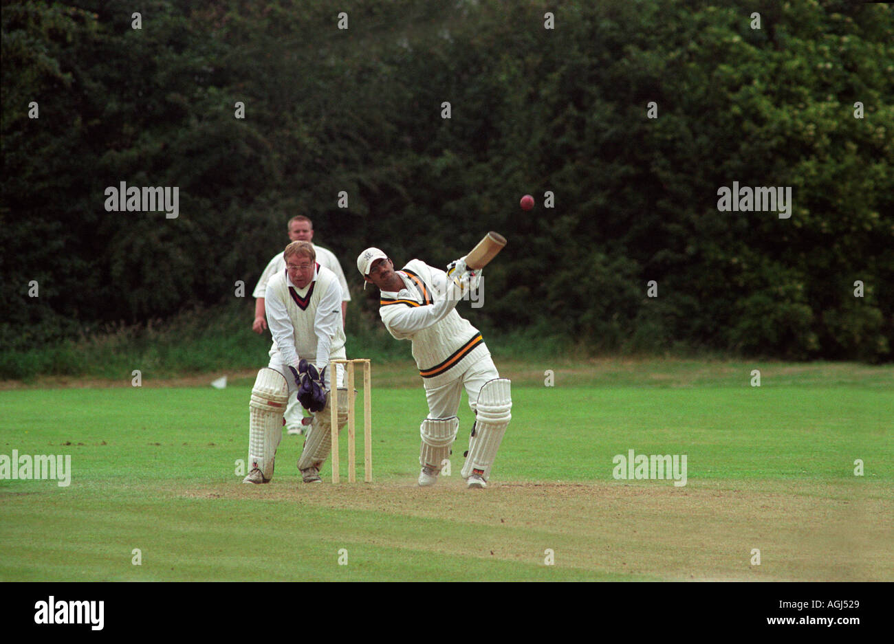 cricket batting hit for six Stock Photo - Alamy