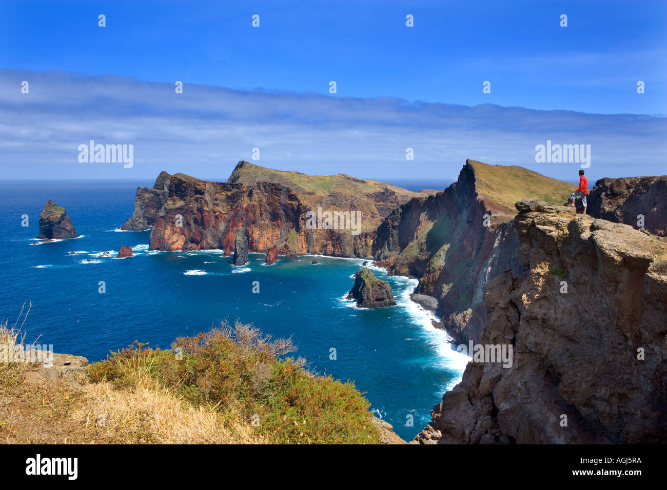 Man standing on clifftop, Madeira Sea Cliffs at point St Lawrence Stock ...